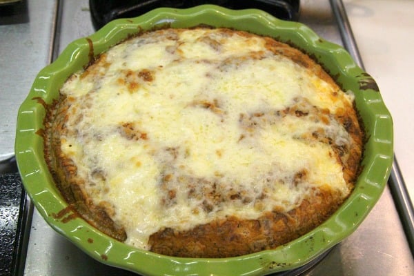 8. Add another little bit of shredded mozzarella to the top during the ...