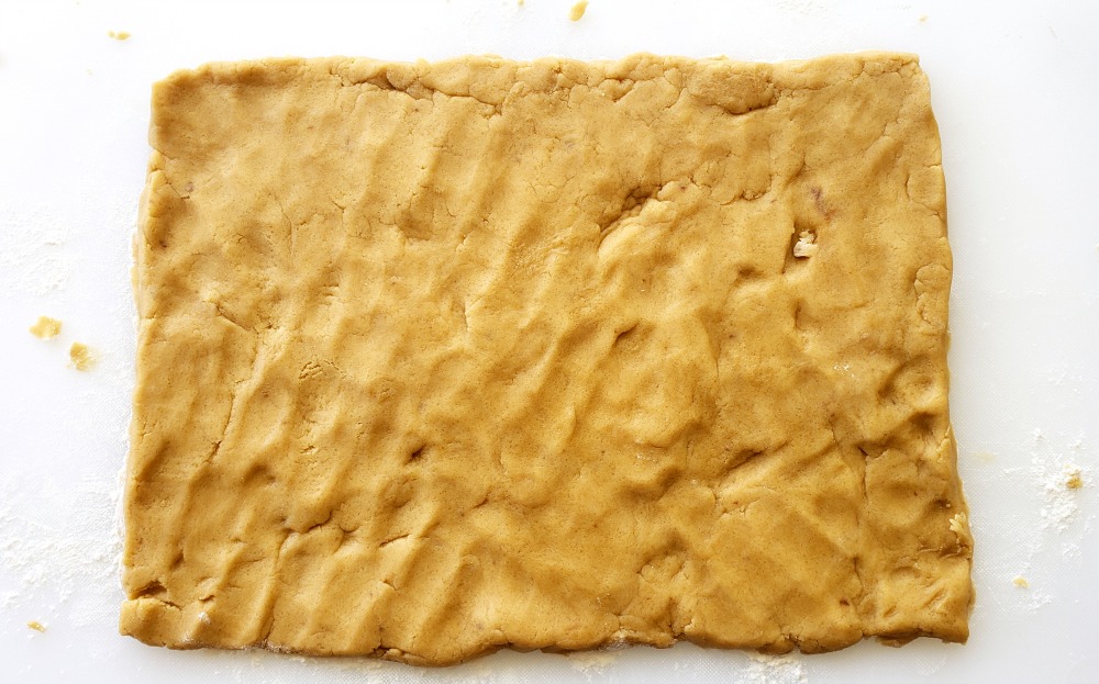 Once I have the right size, I refine the edges and pat it more smoothly.