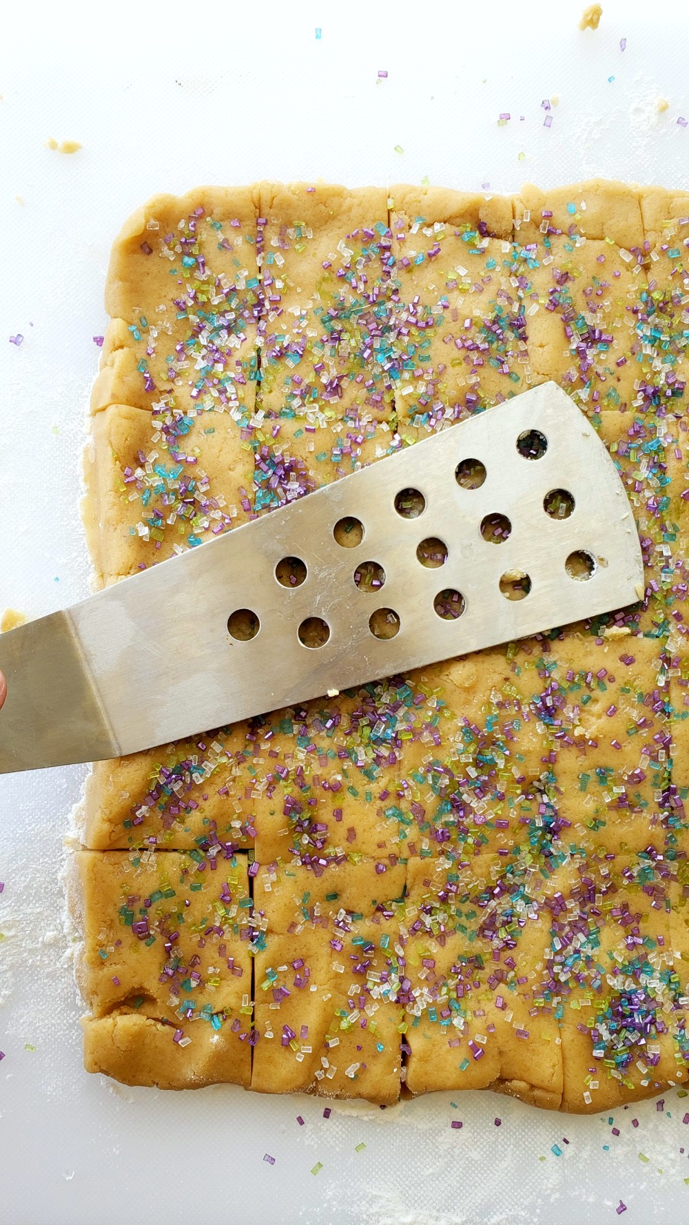 Press down lightly so the crystals adhere. Poke pieces with a fork.
