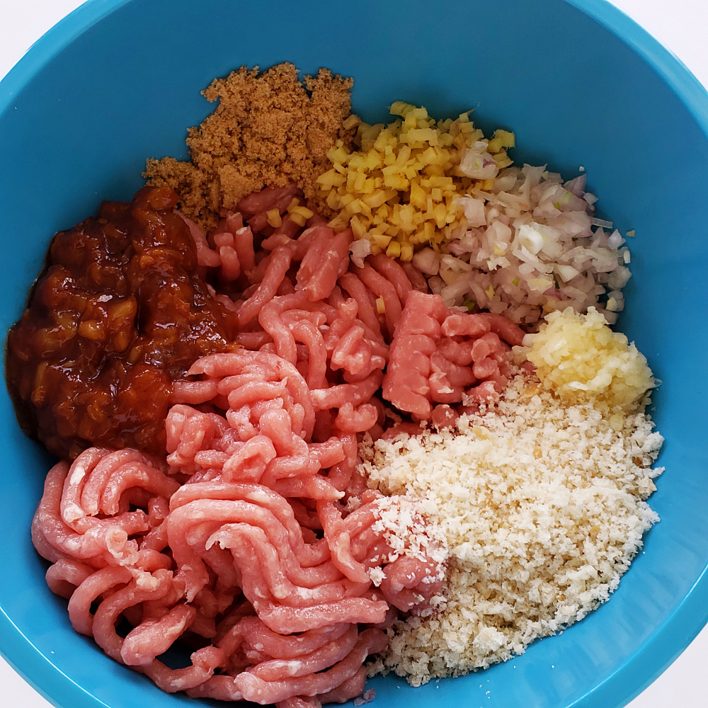 …and we’ll mix some of that sauce into the burger mixture to keep it ...