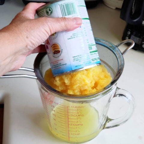 Drain the pineapple (save the juice for later).